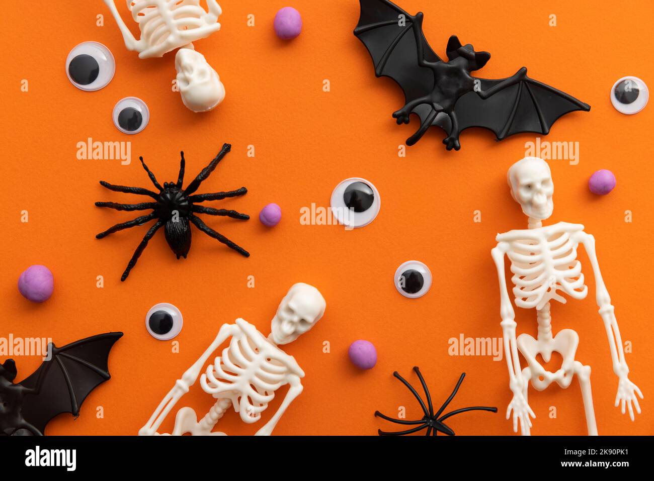 Halloween background with skeletons, bats eyes and spiders Stock Photo ...