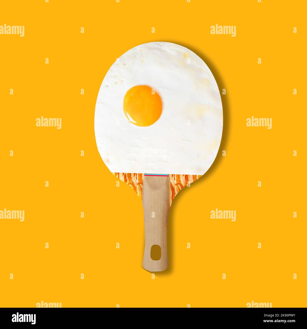 Ping-pong racket made of fried egg and bacon. Sport is health. Photo on ...