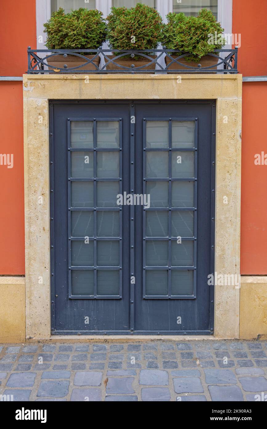 Closed Double Doors With Potted Plants Decor at Terracotta Building ...