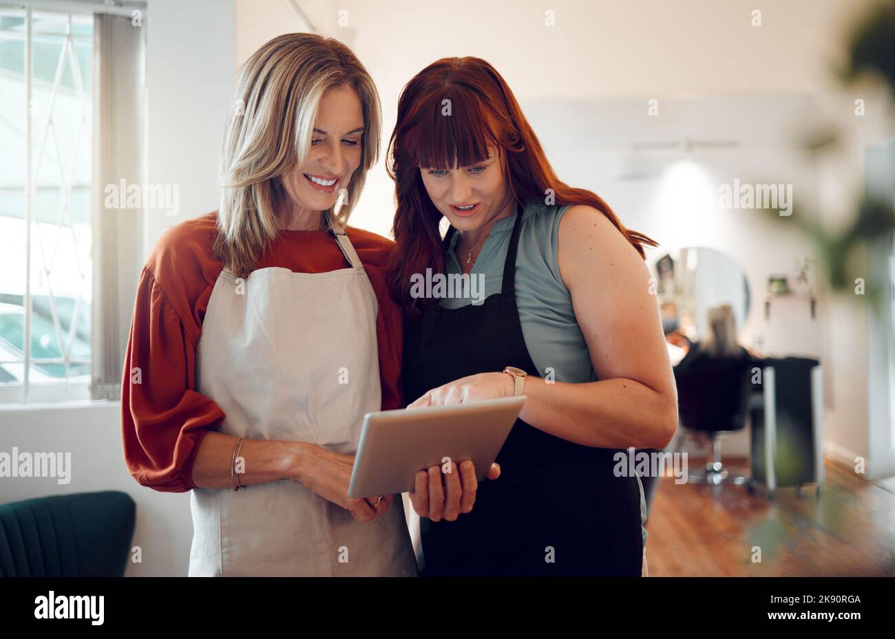 Business, women and tablet use internet, social media and reading or ...