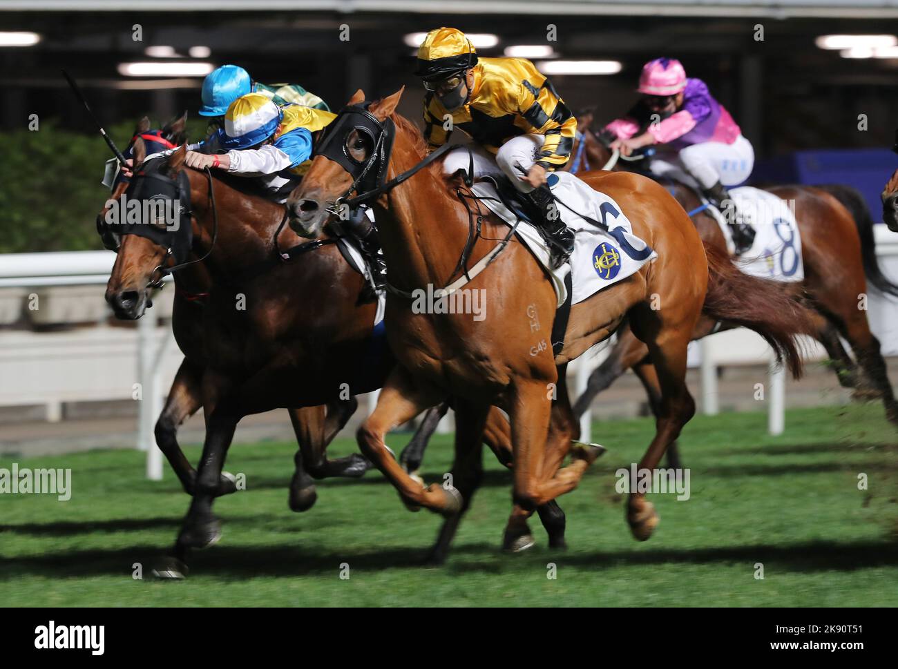 Race 6, FLYING ACE (6), ridden by Matthew Poon Ming-fai (yellow silks), won the class 4 over ...