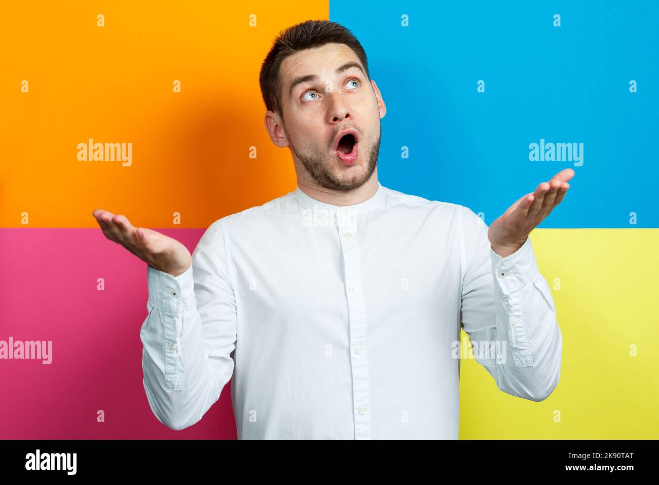 Marshmallows sprinkle on the mans head. Bright man portrait with sweets ...