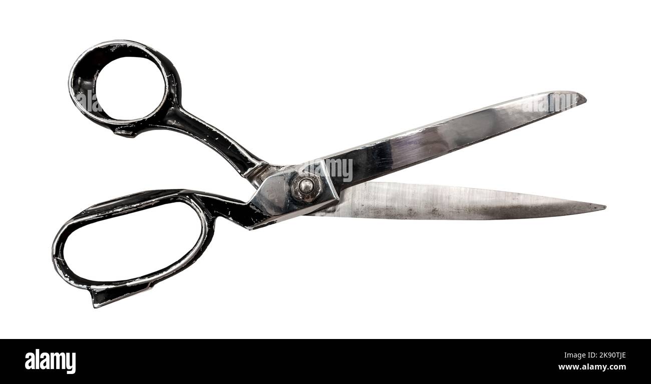 Old vintage tailor or seamstress scissors isolated on white background ...