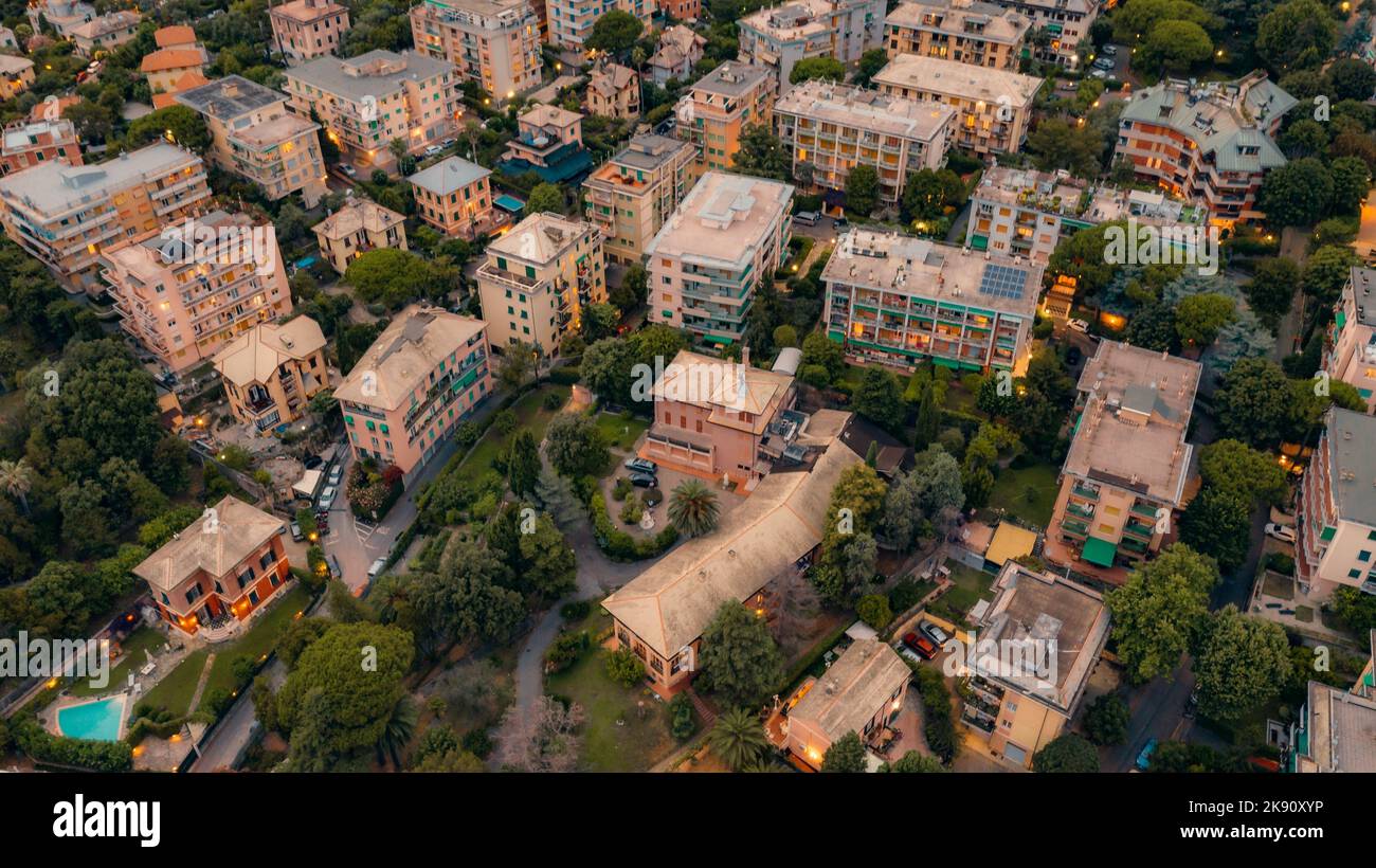 An aerial shot of the historic center Genova with buildings surrounded ...