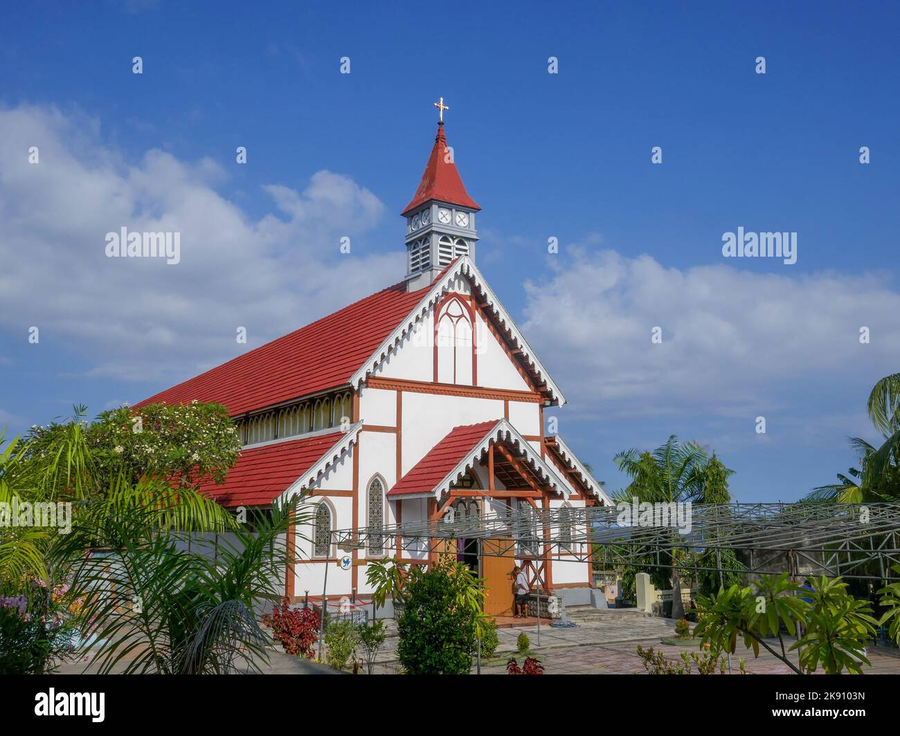 Landscape view of ancient colonial era catholic church in Sikka village ...