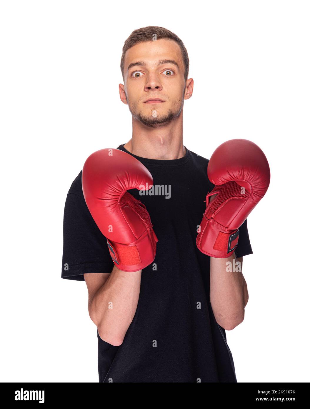 Young man in boxing gloves hi-res stock photography and images - Alamy