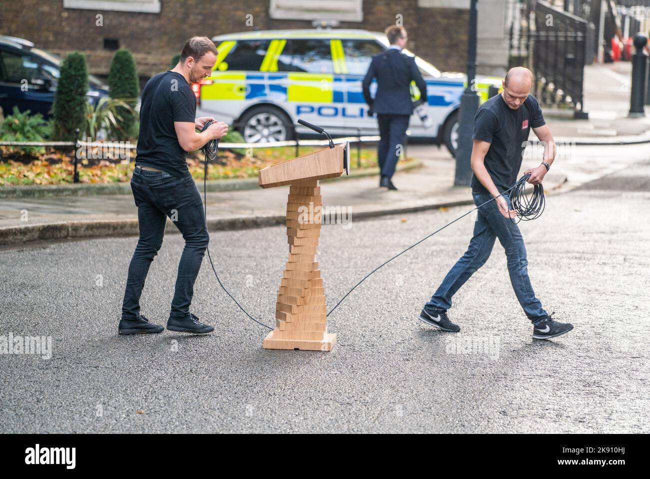 London UK. 25 October 2022 . Staff prepare the custom lectern ahead of ...