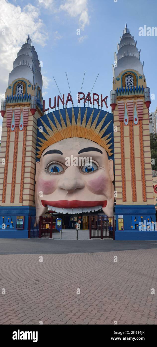 A vertical closeup of Luna Park entrance gate with a face form in ...