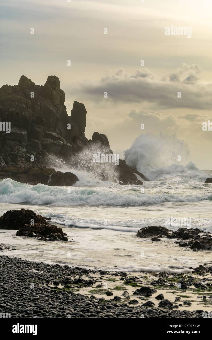 A beautiful shot of an ocean wave hitting the cliff Stock Photo - Alamy