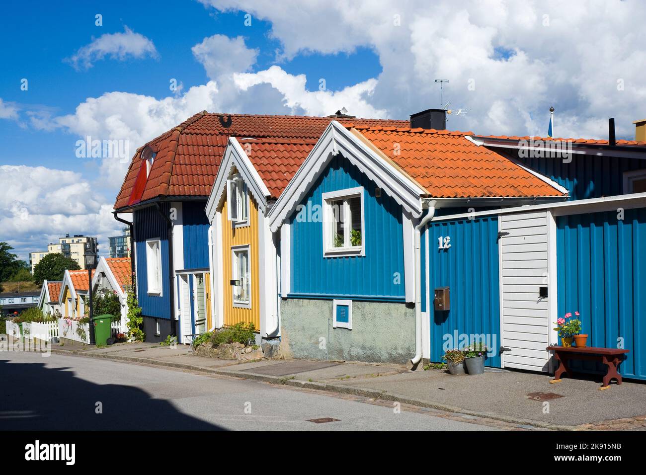 Colorful wooden houses in Bjorkholmen, the oldest district of ...