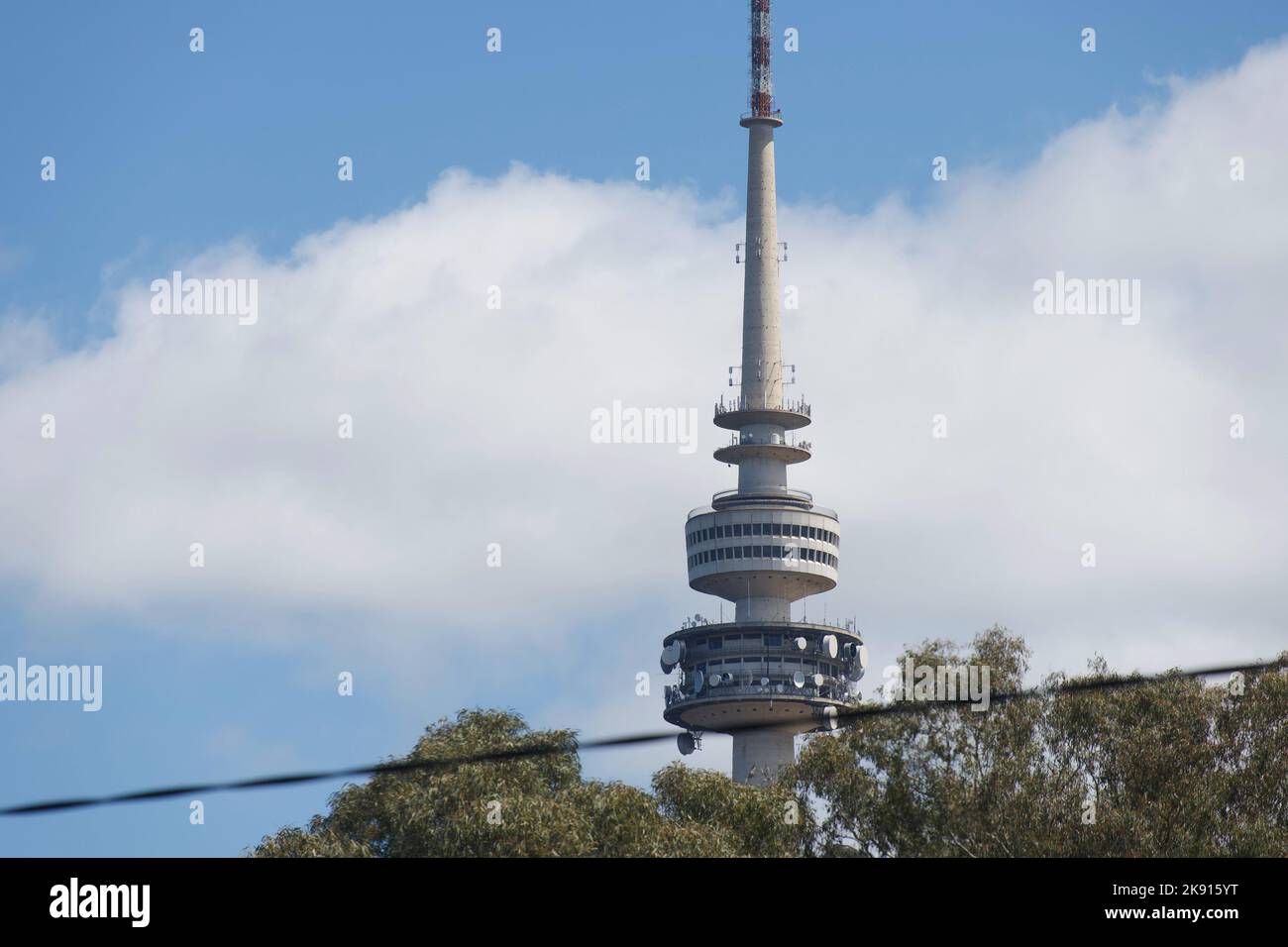 The Telstra Tower with a cloudy sky background Stock Photo - Alamy