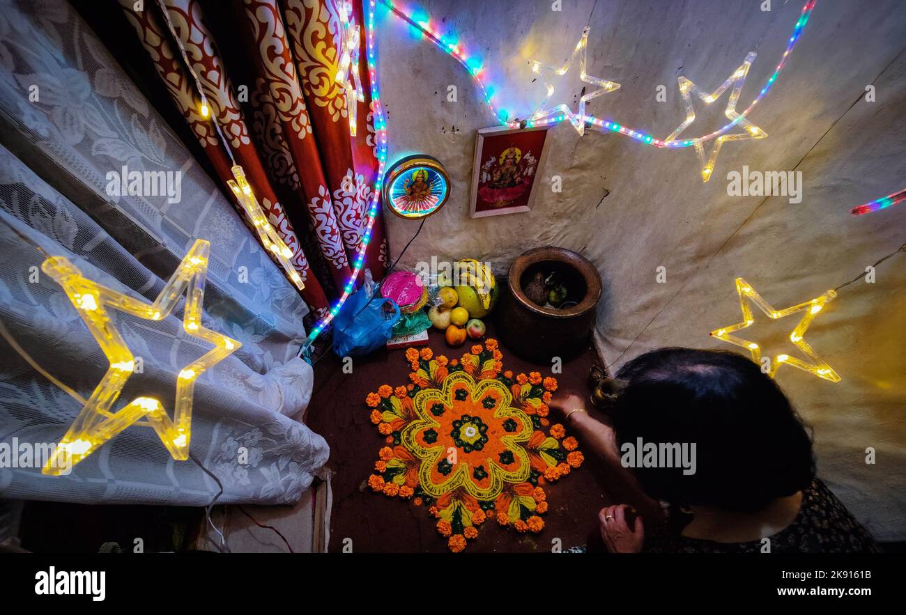 Kathmandu, Bagmati, Nepal. 25th Oct, 2022. A woman prepares colorful ...