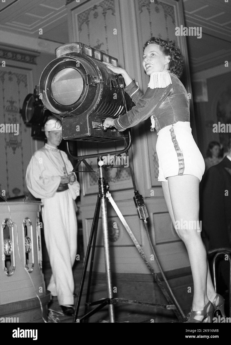 Film studio in the 1940s. A young woman pictured in a film studio ...
