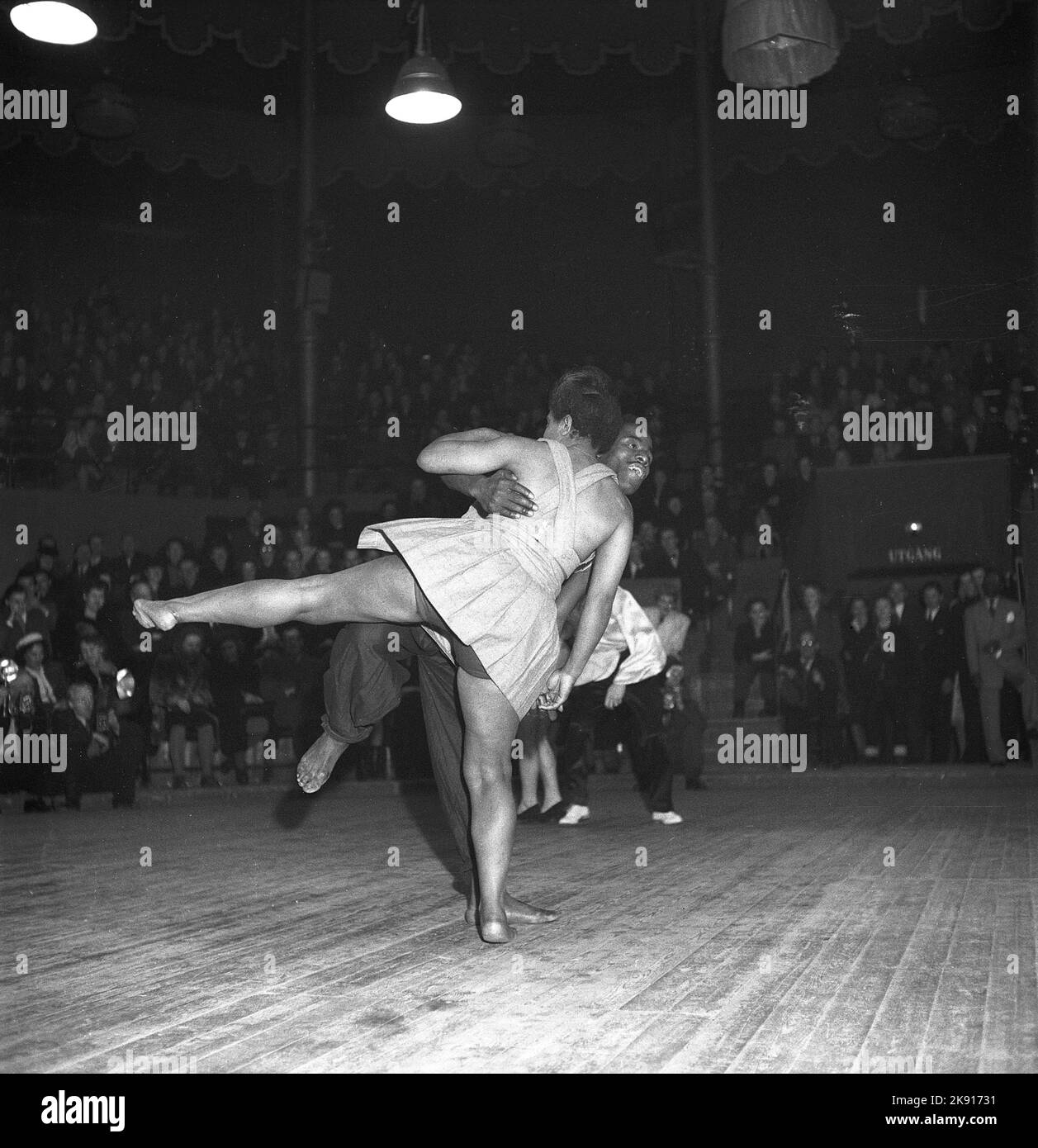 Dancing in the 1940s. Performance dancers on the dance floor at a show where dancing and acting ...