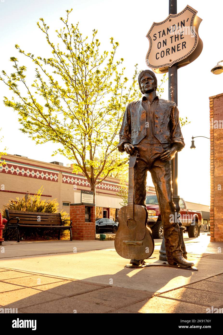 A Standing on the corner sign with a statue in Winslow AZ Stock Photo ...