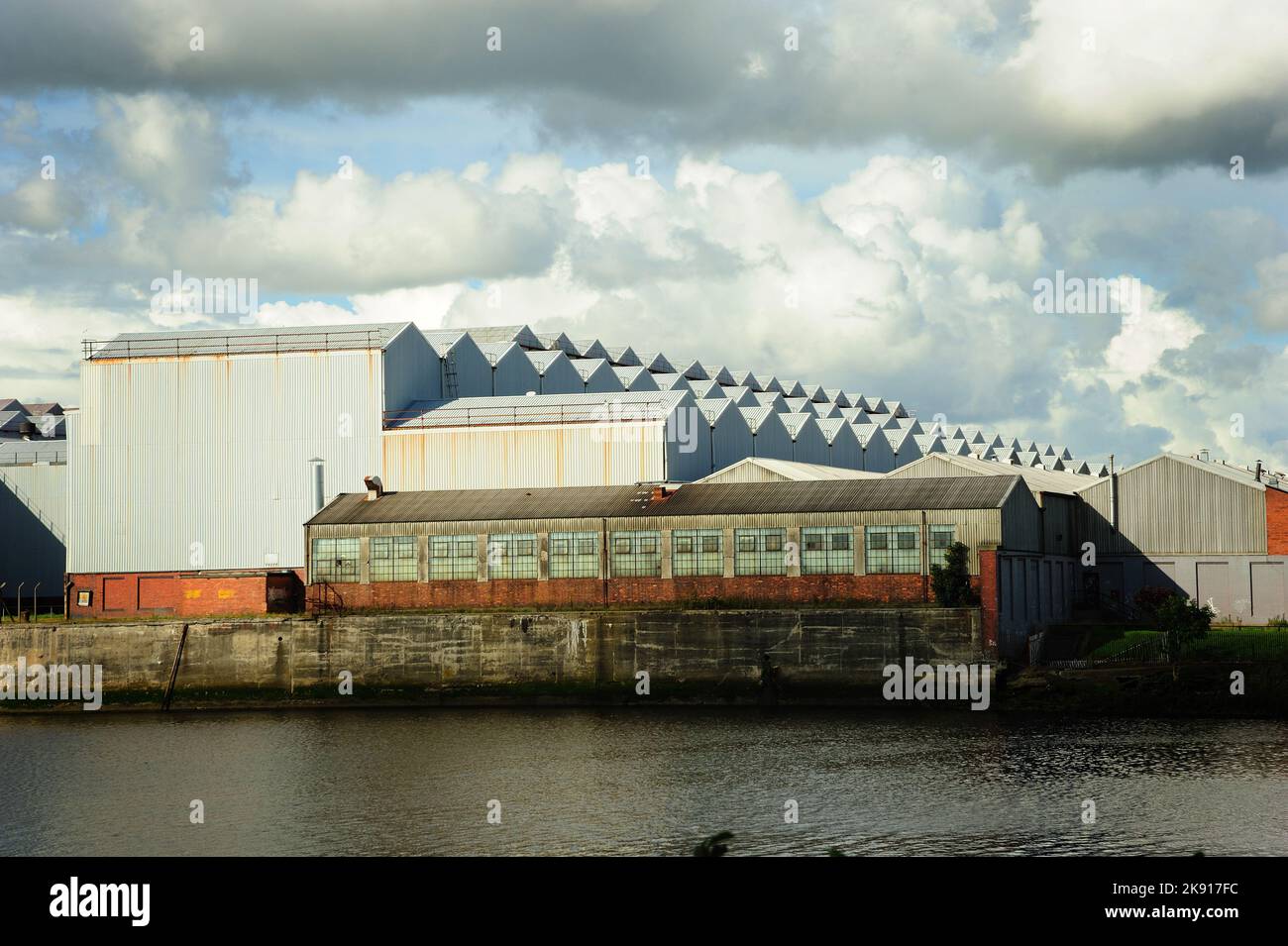 The buildings with spikey roofs at the waterfront of River Clyde Stock ...