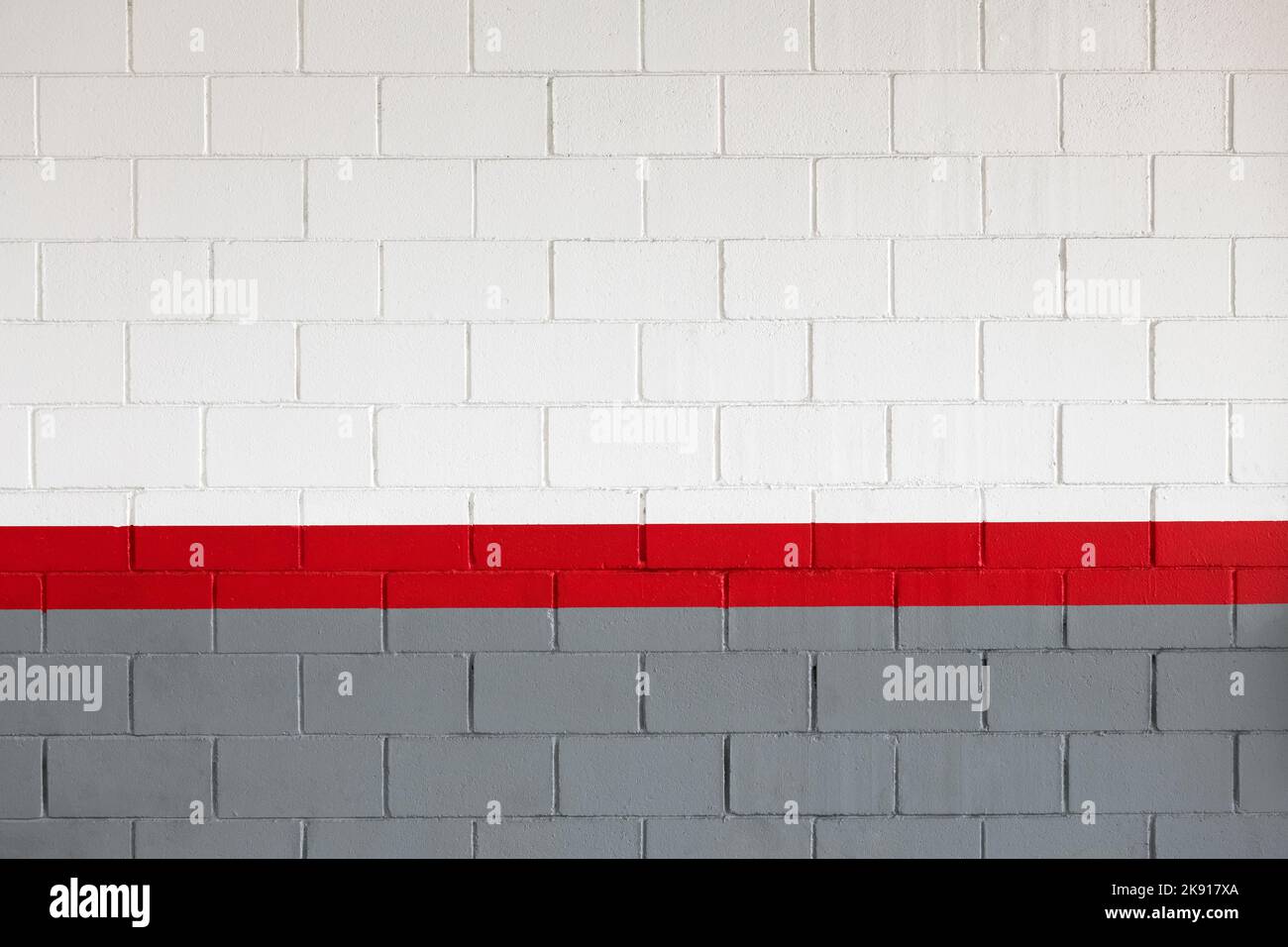 Textured background of brick wall colored in white and gray paints with ...