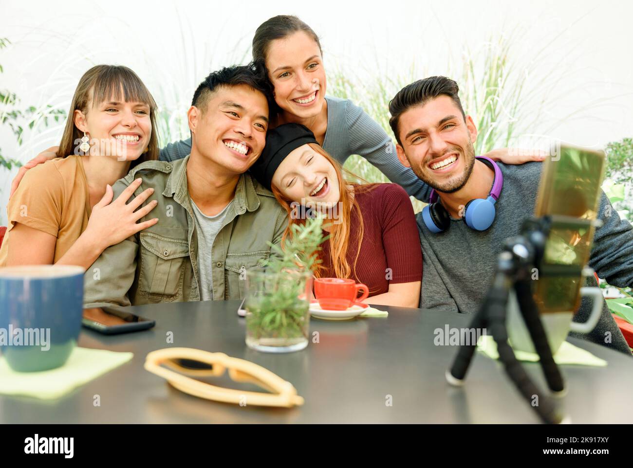 Group of happy multiracial friends having video call on smartphone ...