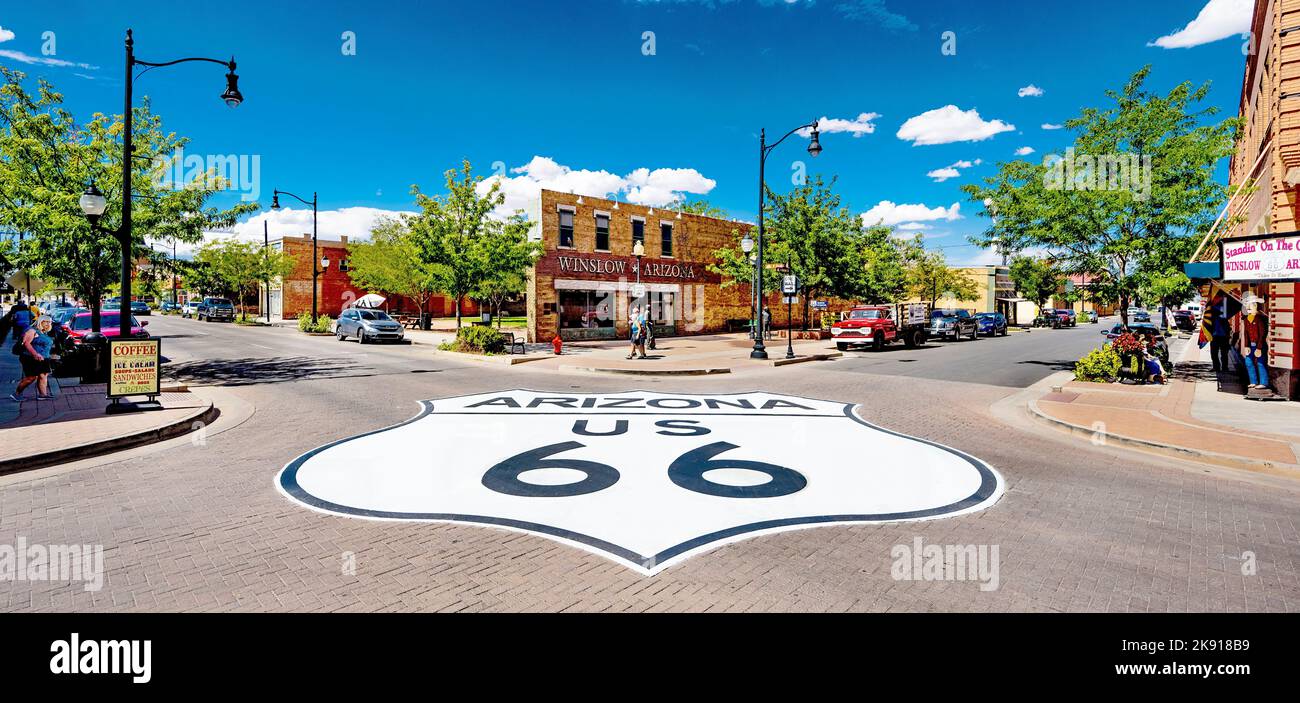 The Route 66 sign painted on the square in Winslow, Arizona Stock Photo ...