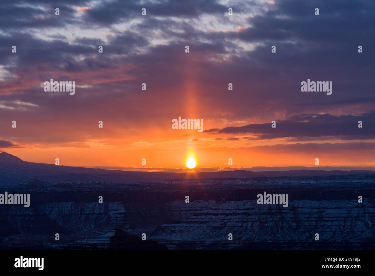 A sun pillar at sunrise at Dead Horse Point State Park, Moab, Utah. Sun ...