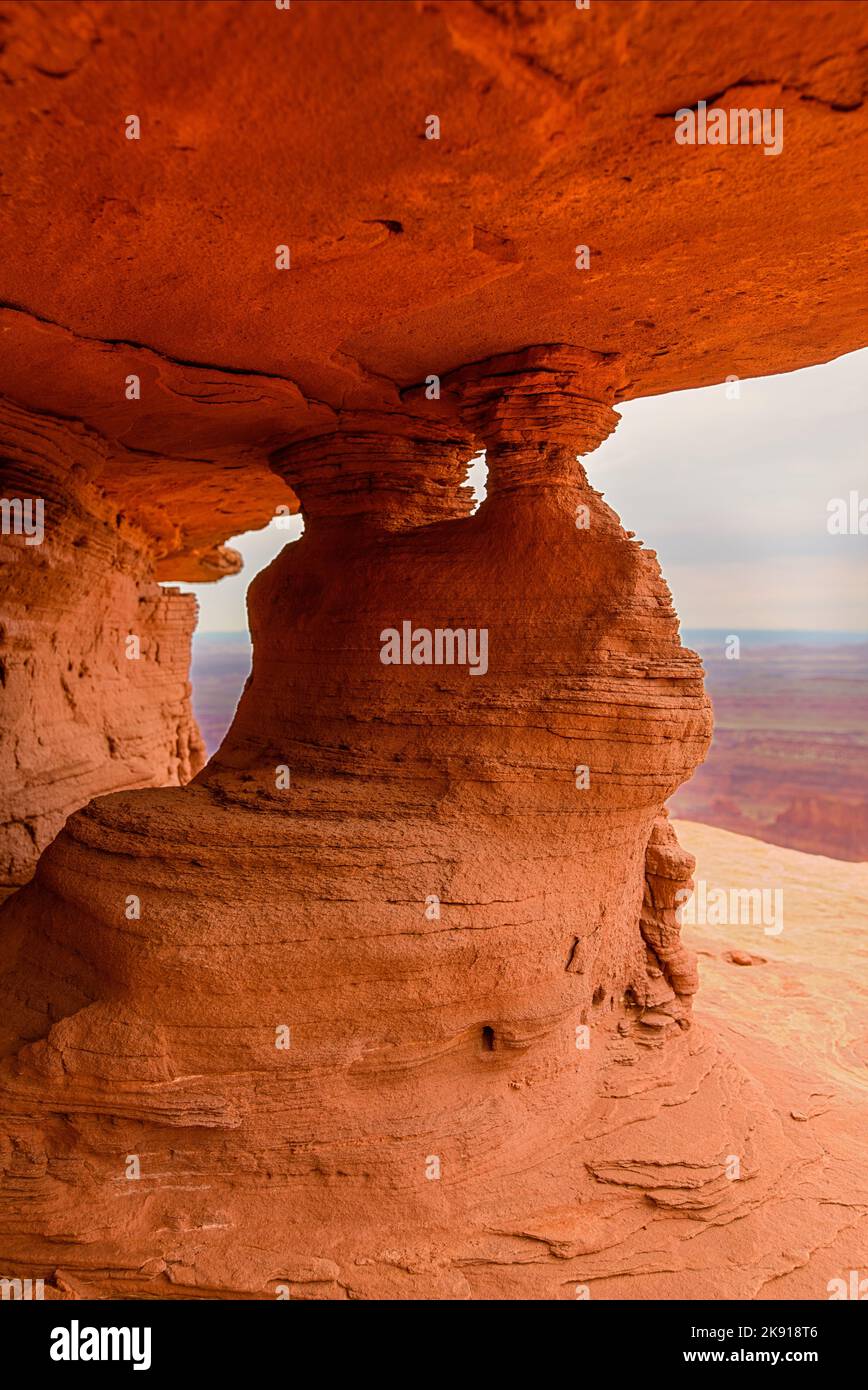 A micro arch in Kayenta sandstone on the edge of the canyon at Dead ...