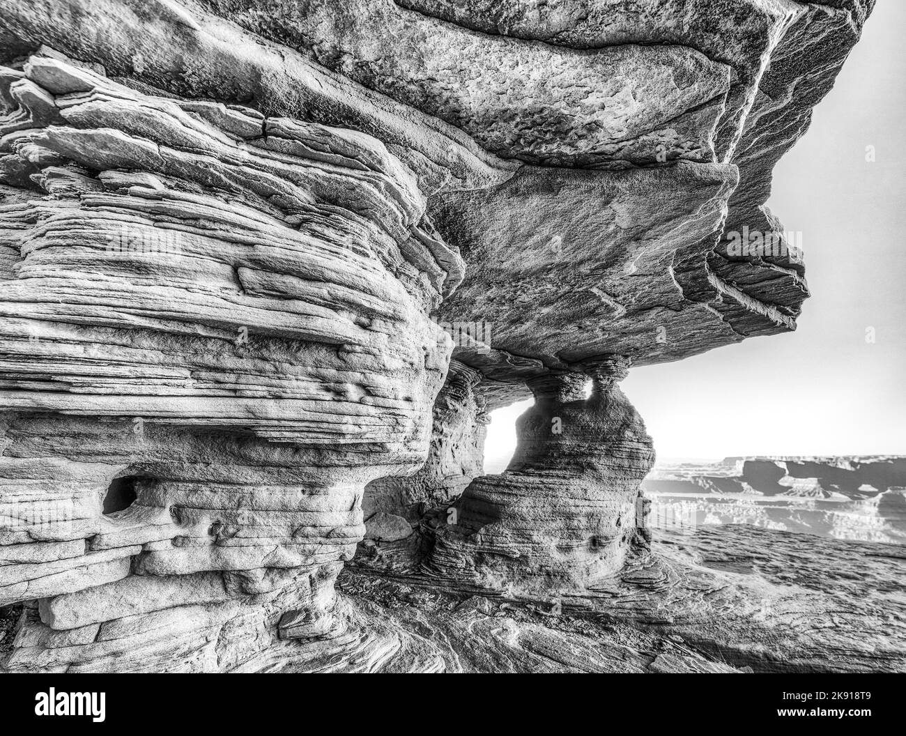 A micro arch on the edge of the canyon at Dead Horse Point State Park ...