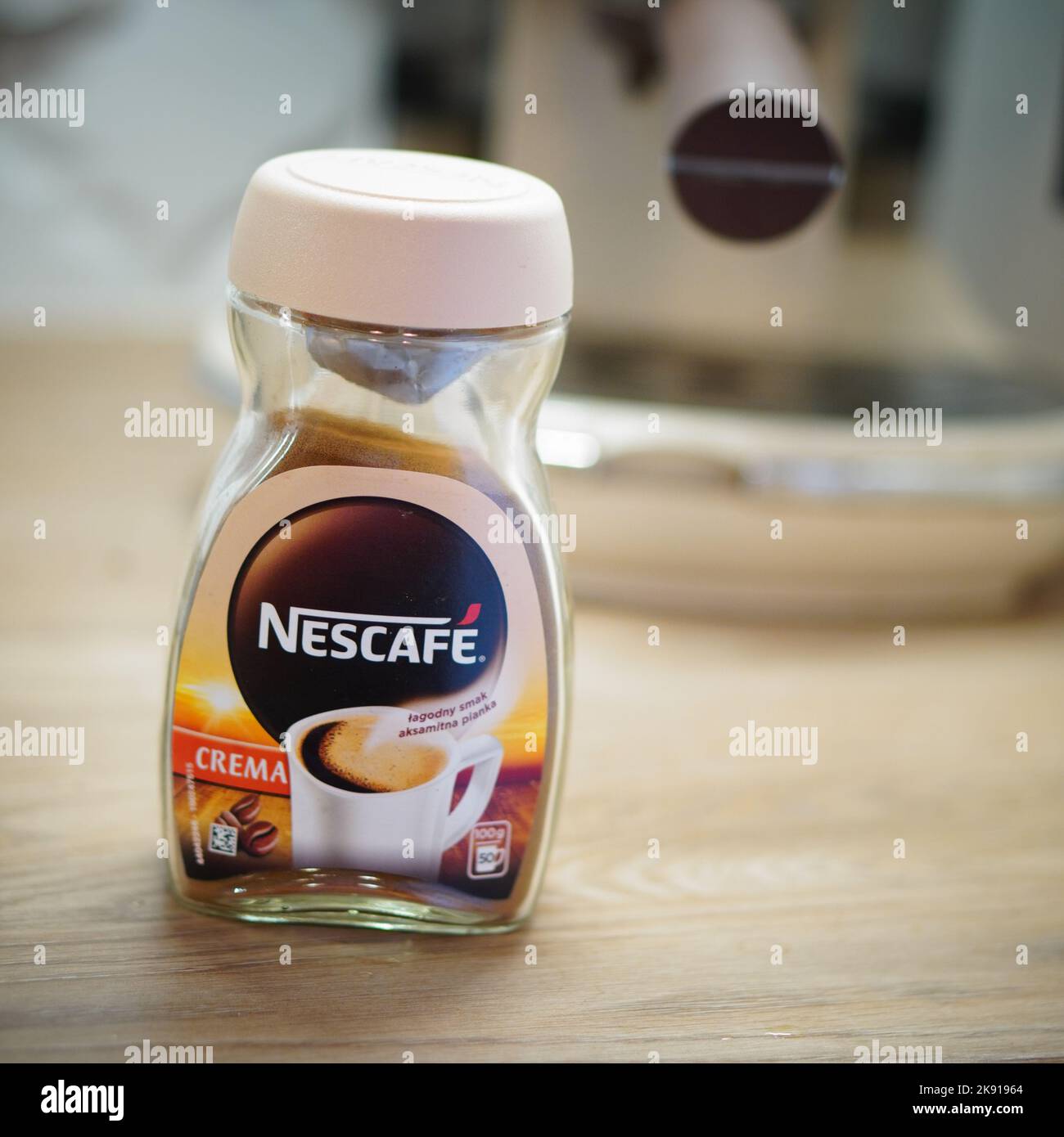 A closeup of Nescafe instant coffee Crema in a glass jar standing on a ...
