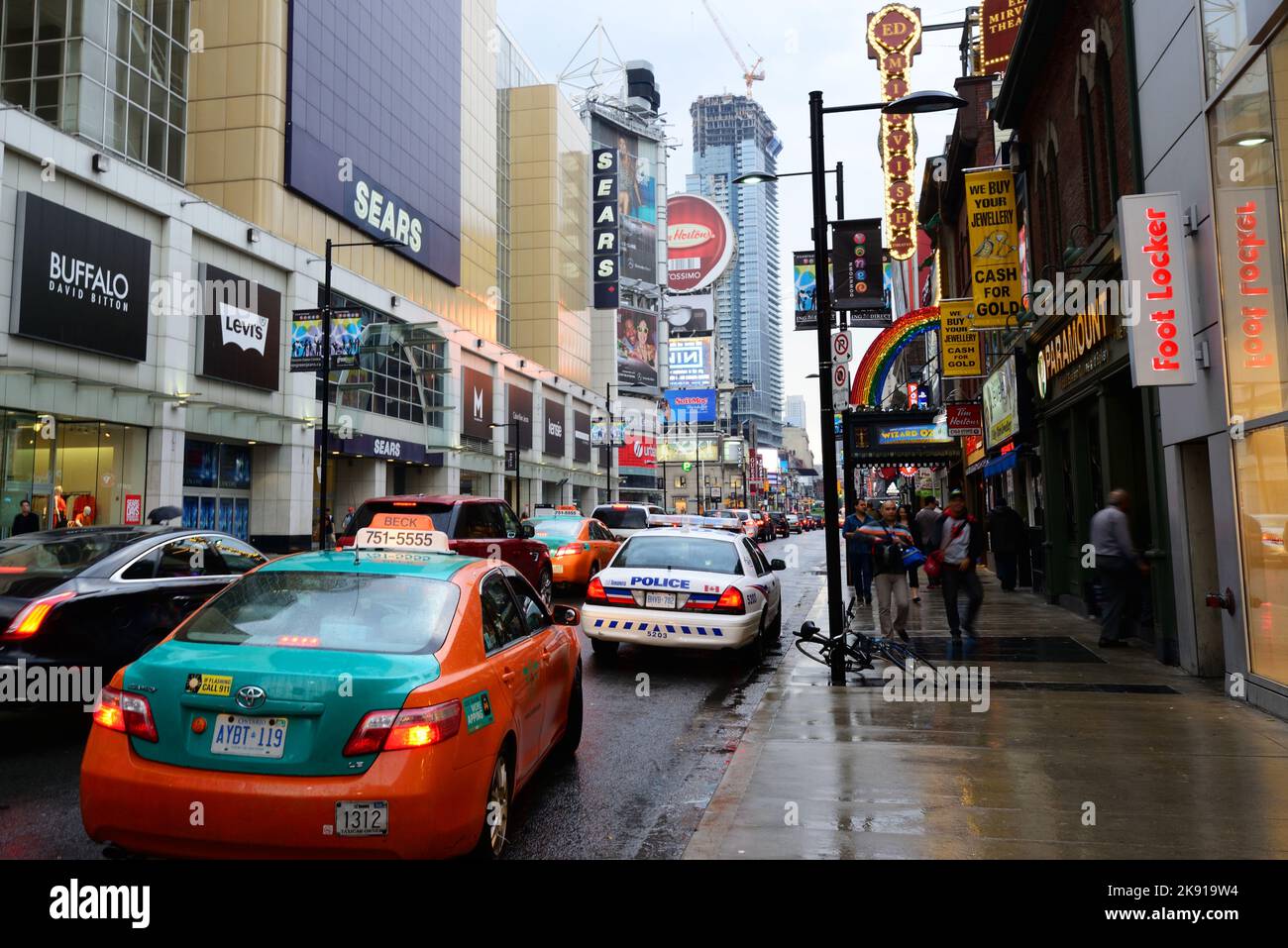 A rainy evening with traffic cars in downtown Toronto, Canada Stock ...