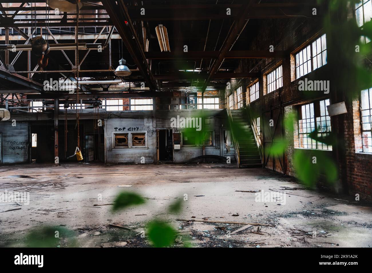 The interior of an old abandoned warehouse Stock Photo - Alamy