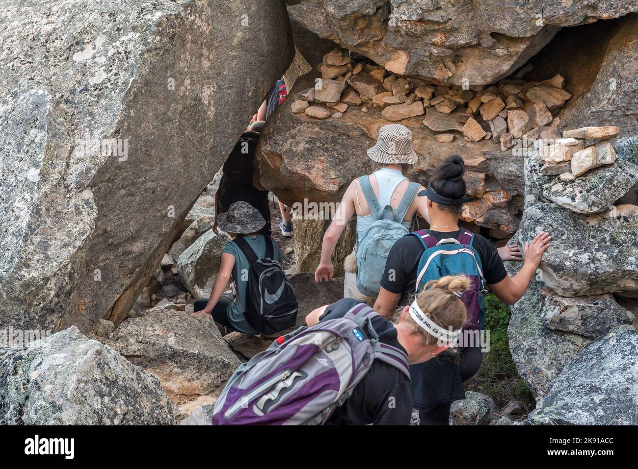 SANDDRIF, SOUTH AFRICA - SEP 7, 2022: Hikers descending Wolfberg below ...