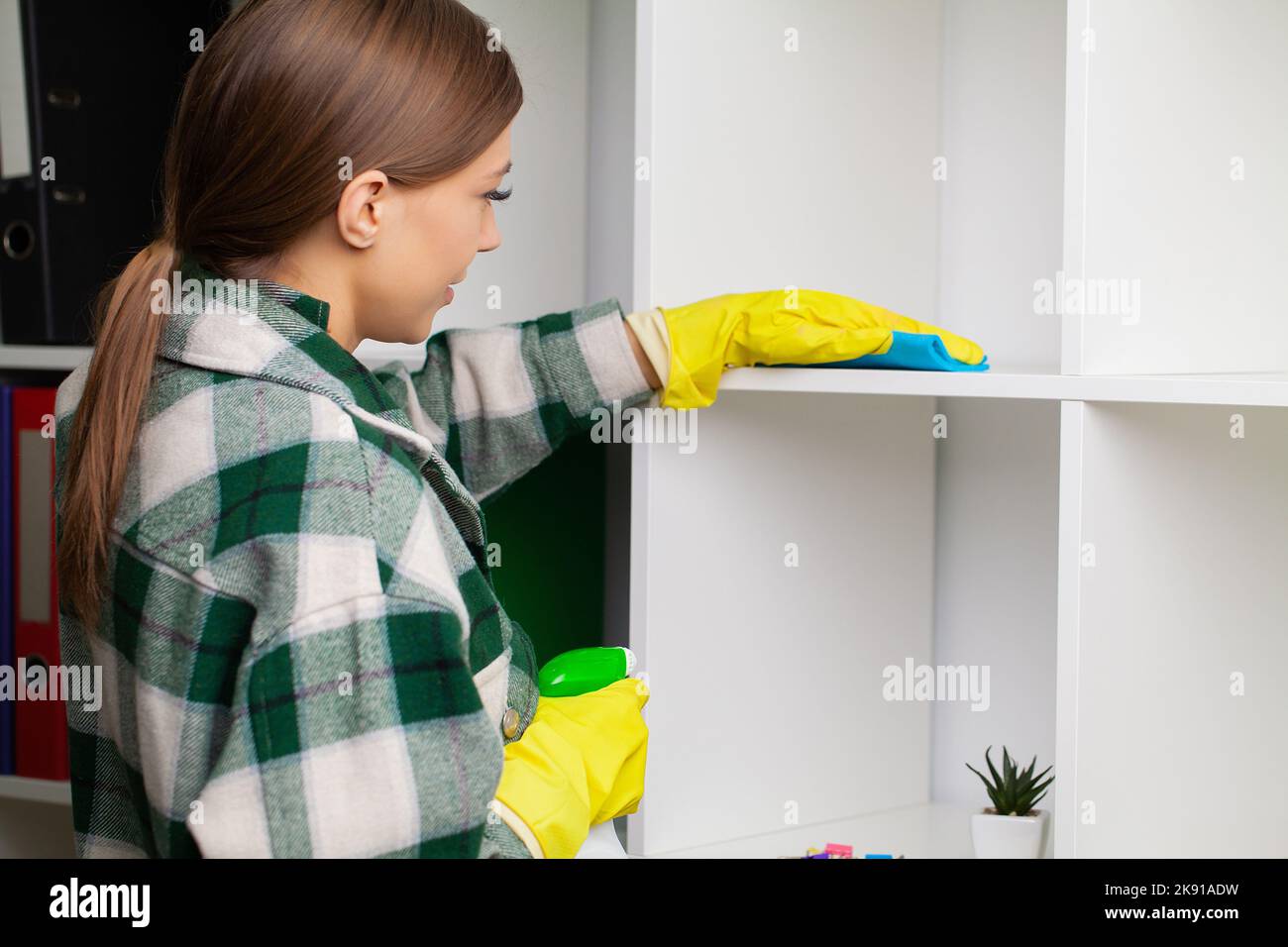 Cleaner Cleaning Desk With Rag In Office Stock Photo - Alamy