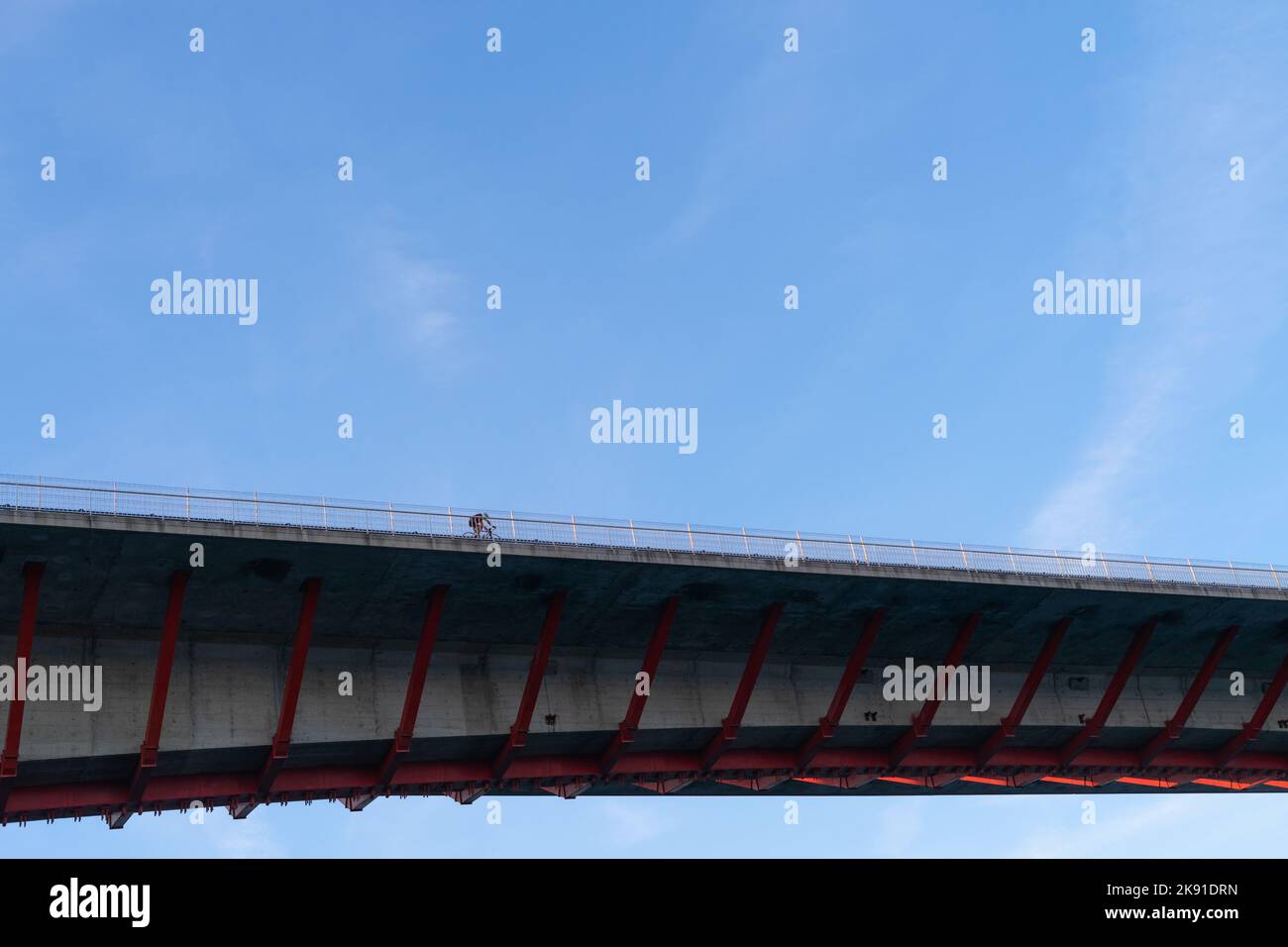 Puente de los Santos, with cyclist. Border of Asturias and Galicia ...