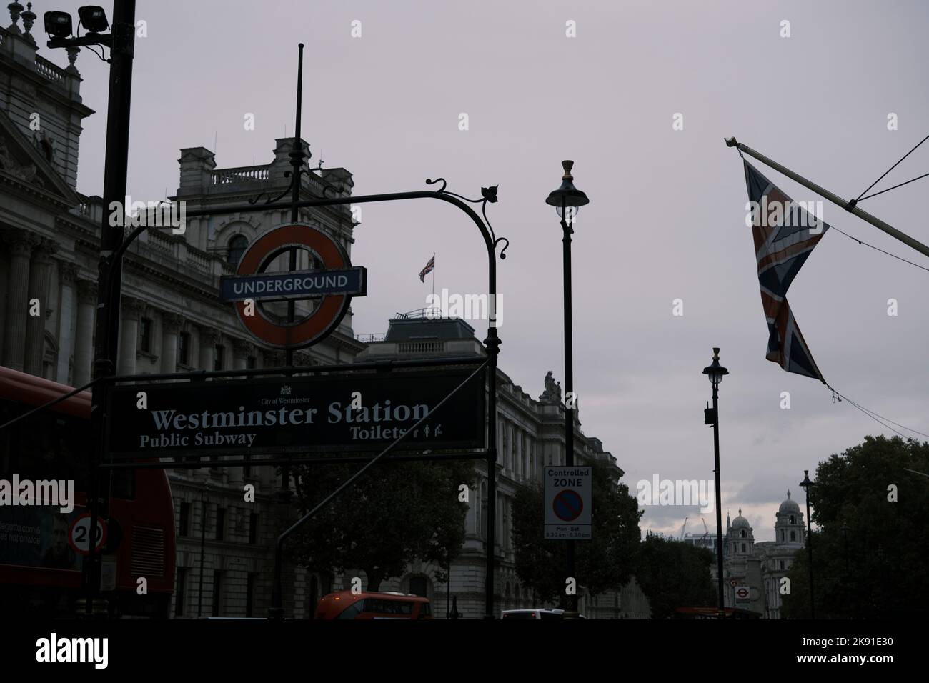 The Westminster Tube Station with the UK national flag waving near Big ...