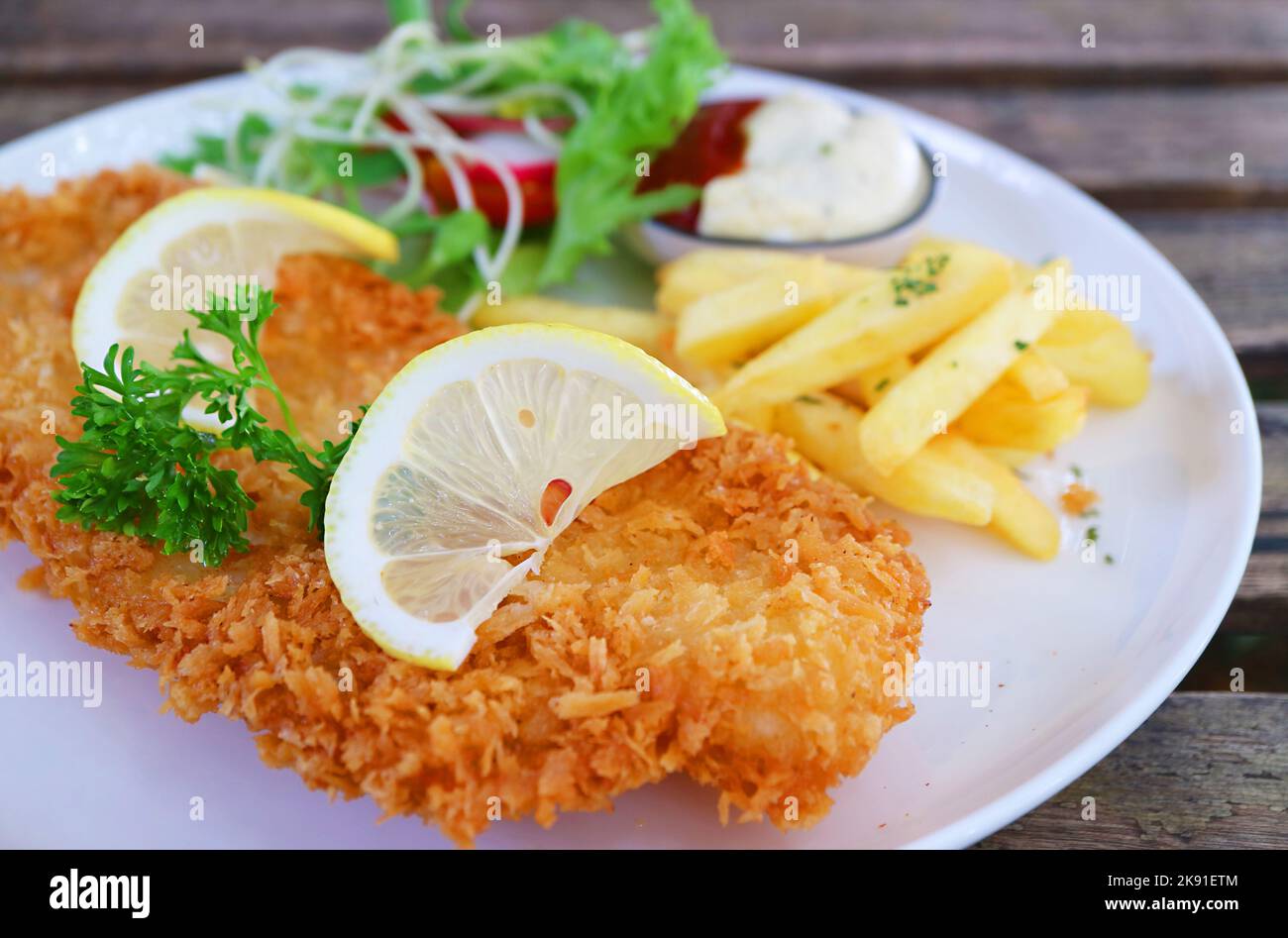 Closeup of mouthwatering crispy fried fish with chips Stock Photo - Alamy