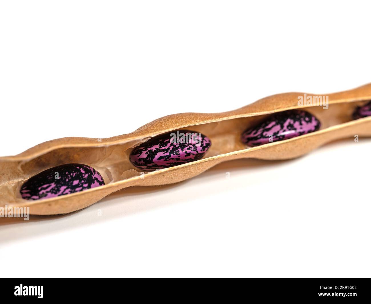 Runner beans in pod against white background Stock Photo - Alamy