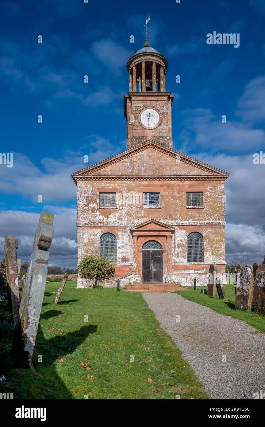 A vertical view of the building and cemetery stones of Kirkandrews ...