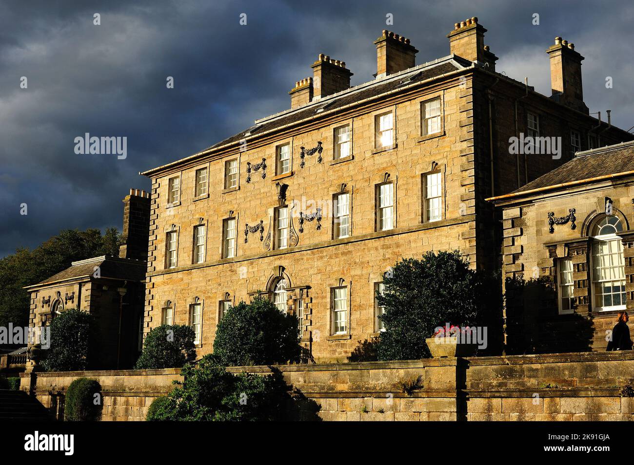 A beautiful view of the Pollok House with a cloudy sky background in ...