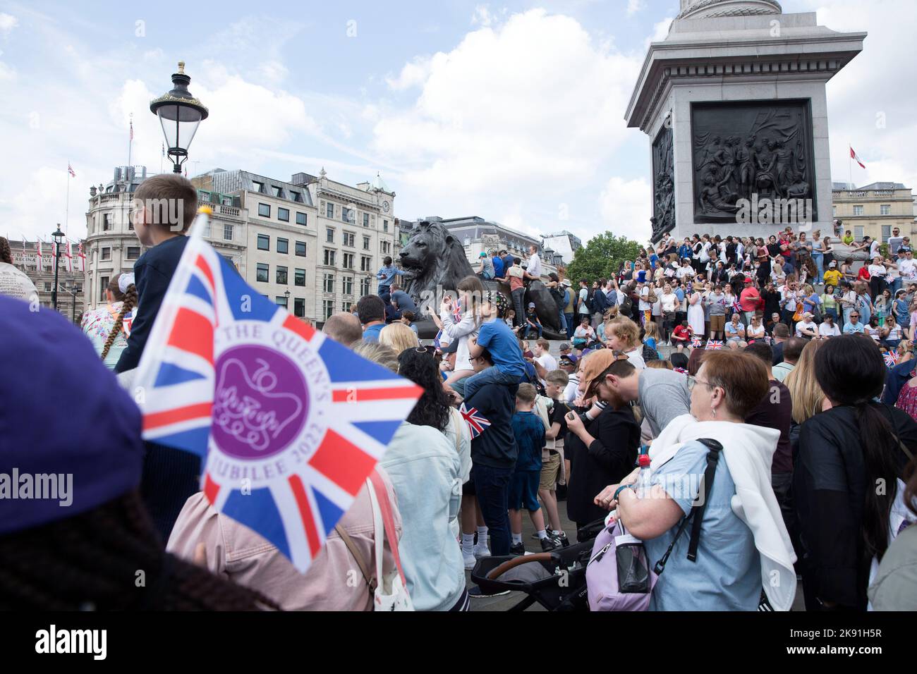 Revellers with Union flags gather in Trafalgar Square, central London ...