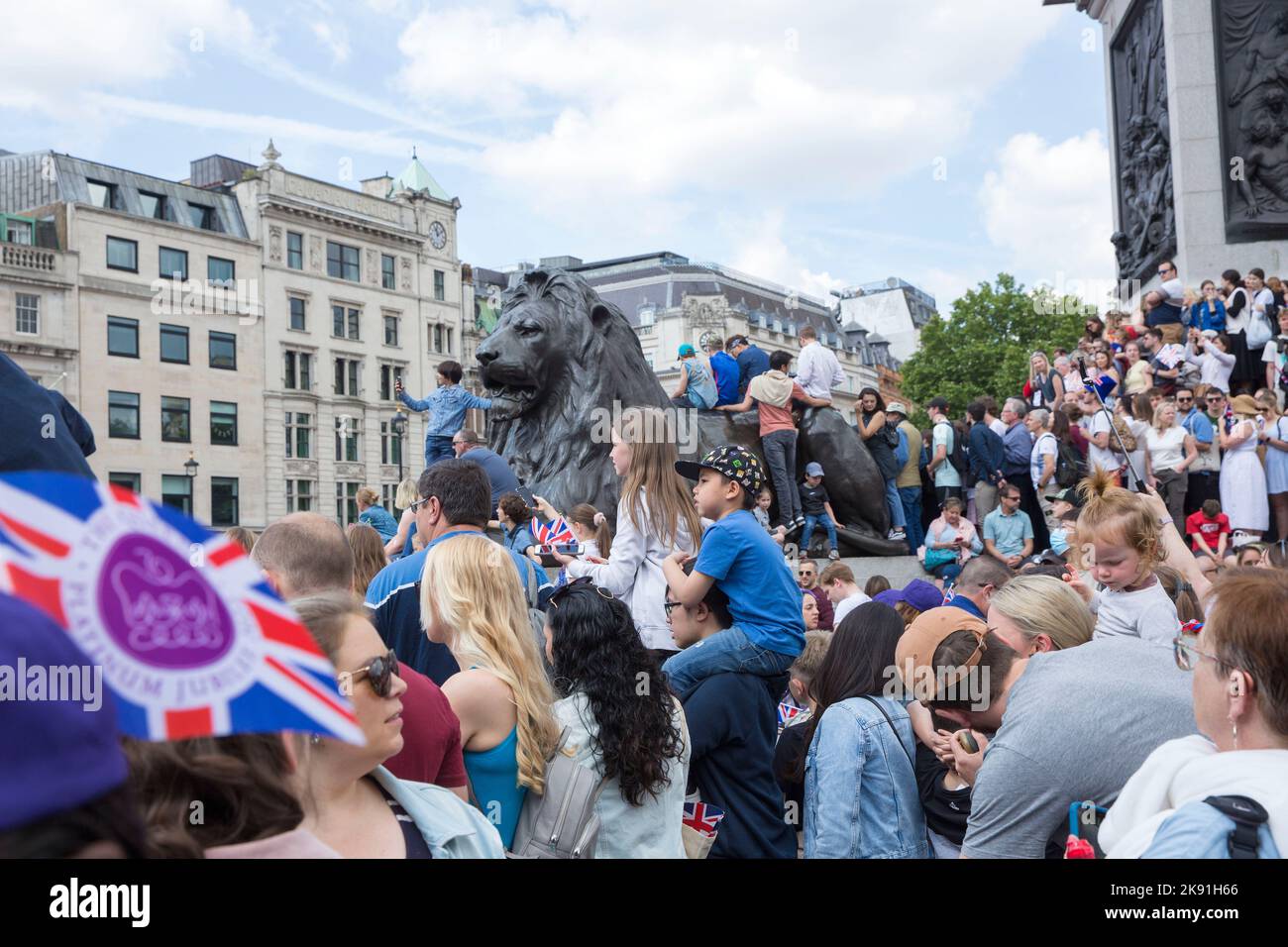 Revellers with Union flags gather in Trafalgar Square, central London ...
