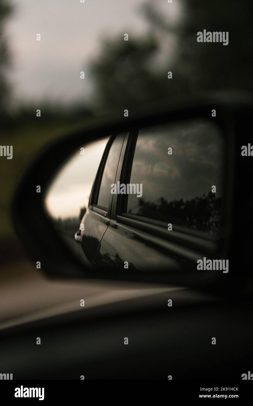 A reflection in a side-view mirror Stock Photo - Alamy