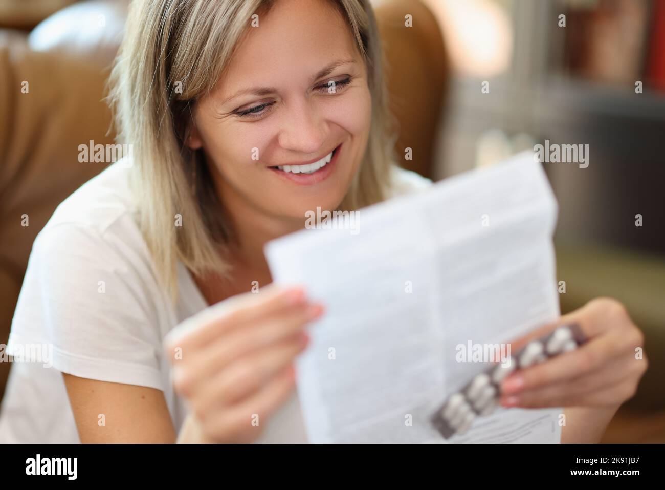 Woman reading instructions hi-res stock photography and images - Alamy