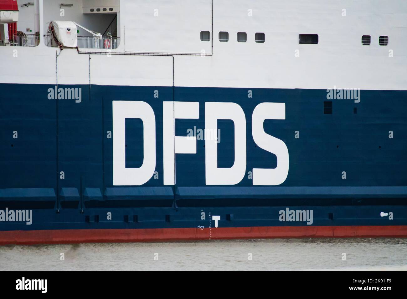 The logo of the Scandinavian ferry company DFDS is on the hull of the ...