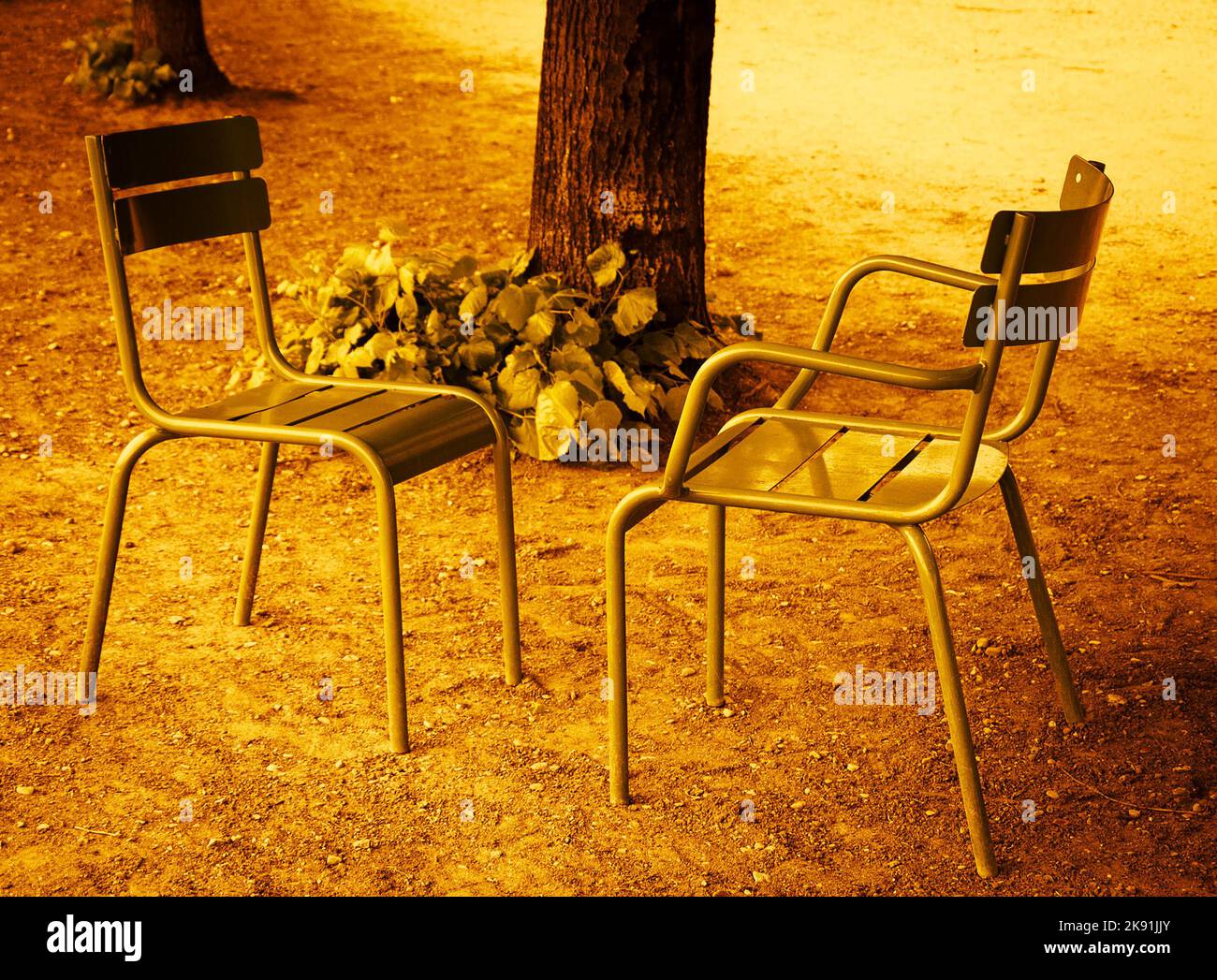 Dialogue. Two chairs facing each other in Tuileries garden. Paris ...