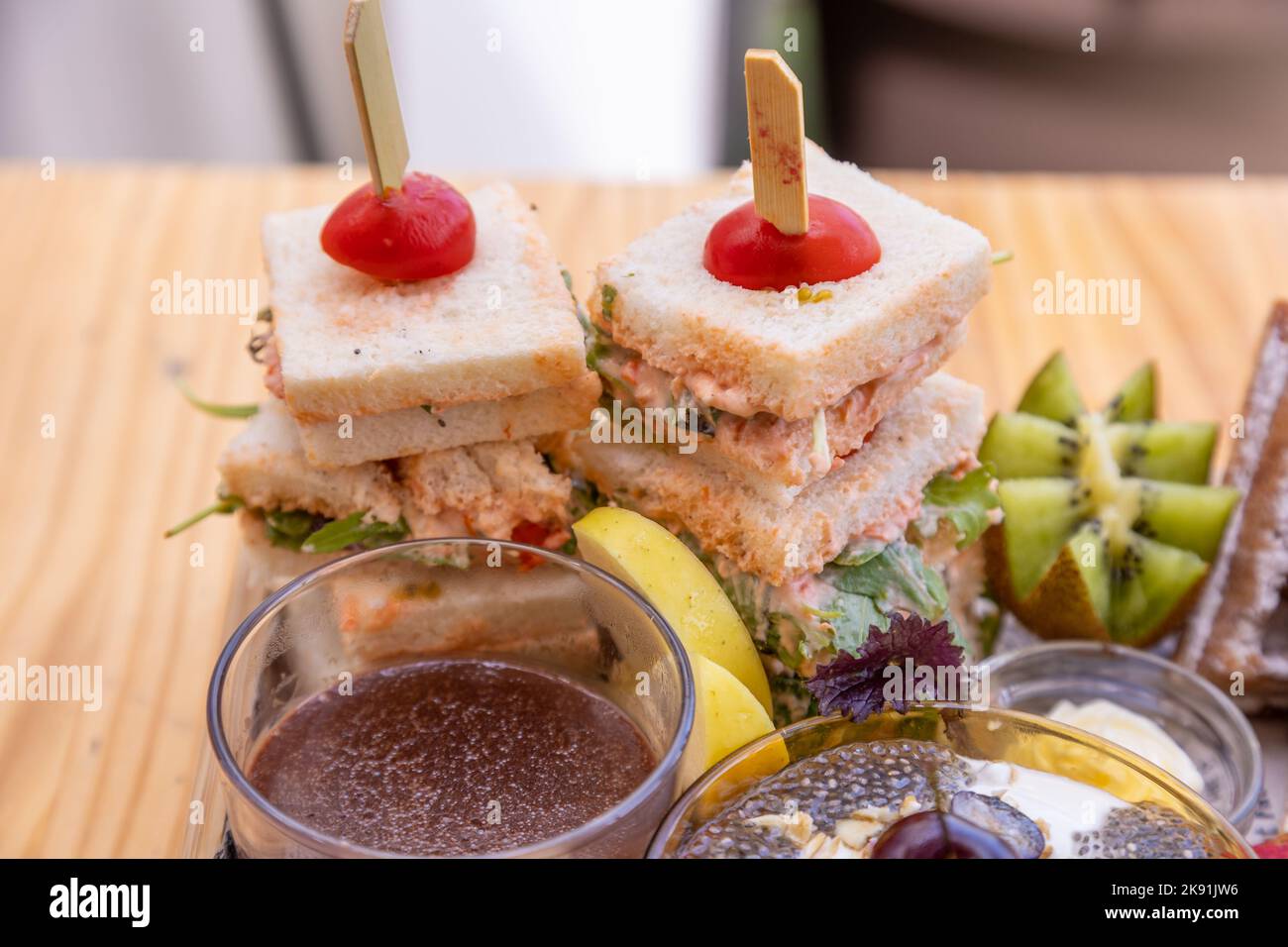 A closeup shot of mini sandwiches in a food plater Stock Photo - Alamy