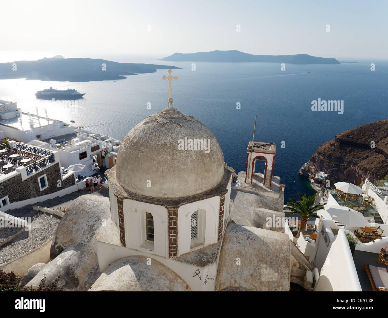 St John the Theologian Church in Fira with a cruise ship on the caldera ...