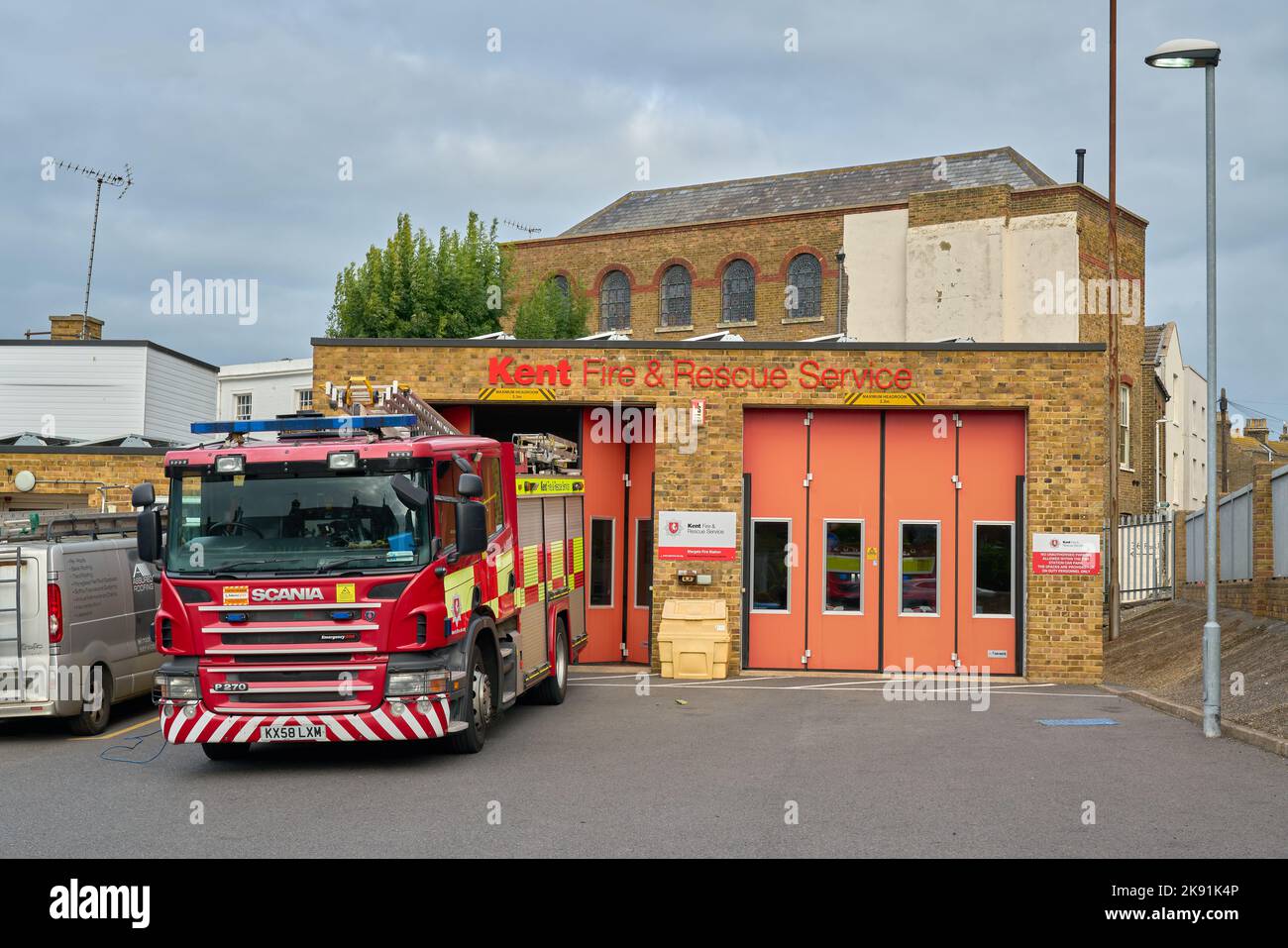 The Kent Fire and Rescue Service building with orange doors, red fire ...