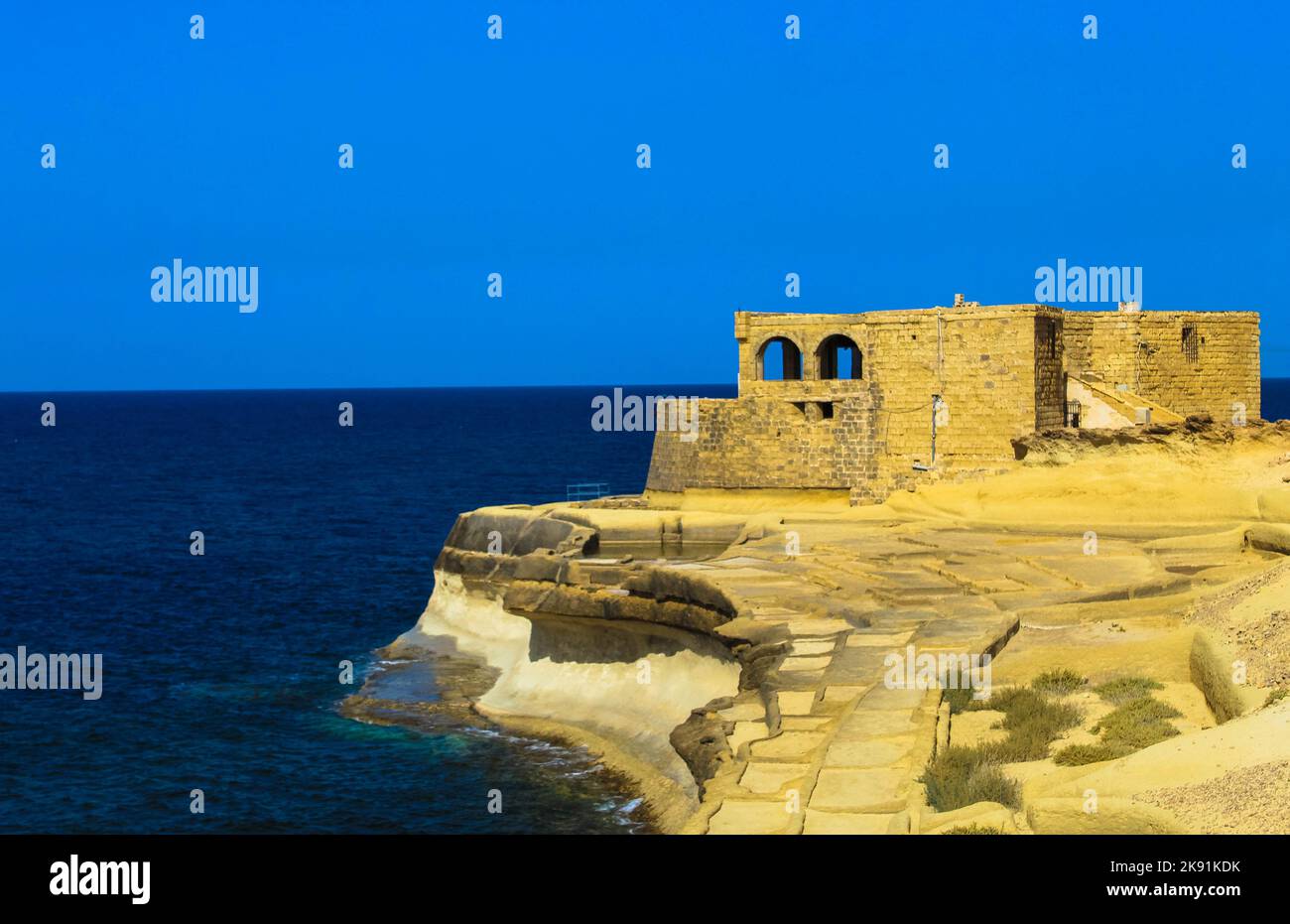 A high-angle of Qolla l-Bajda battery with the seascape view, clear sky ...