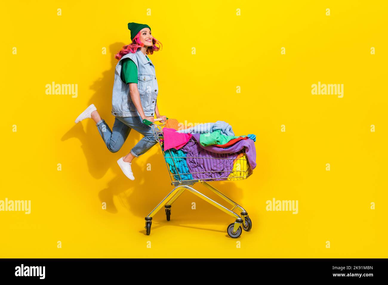 Full length photo of cheerful positive girl dressed denim vest jumping ...