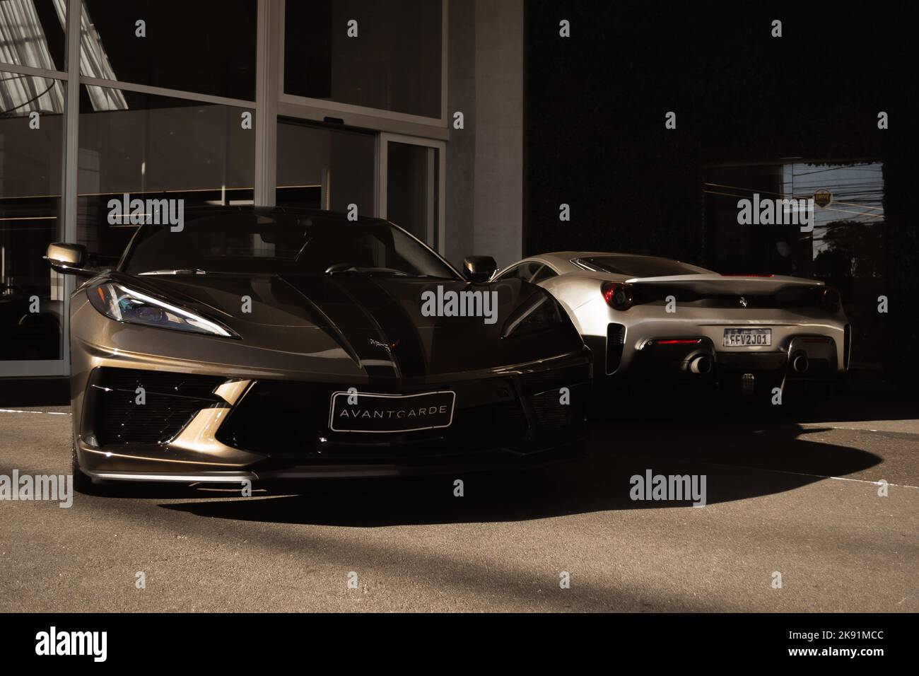 A Bronze Corvette Stingray C8 And Ferrari 488 Pista Side by side ...