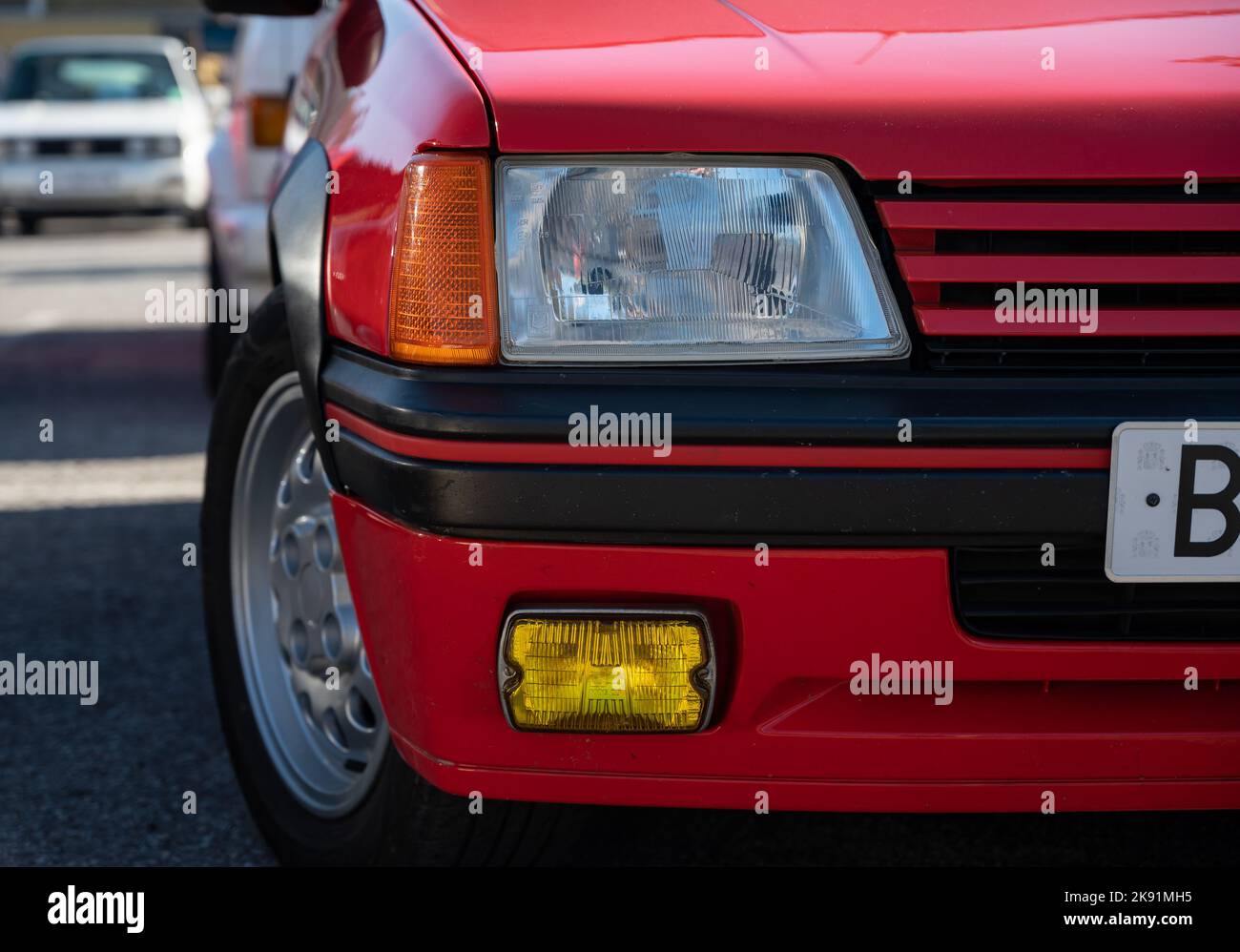 A closeup of a detail of an old red Peugeot 205 car Stock Photo - Alamy